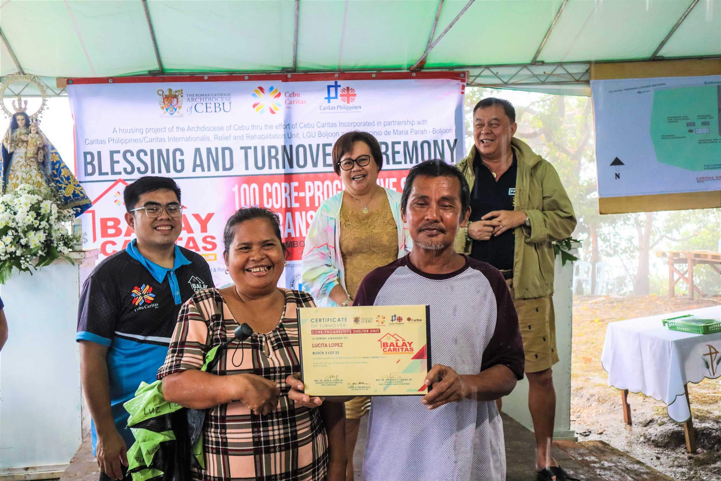 Archdiocese of Cebu turns over 135 houses to beneficiaries in Boljoon
